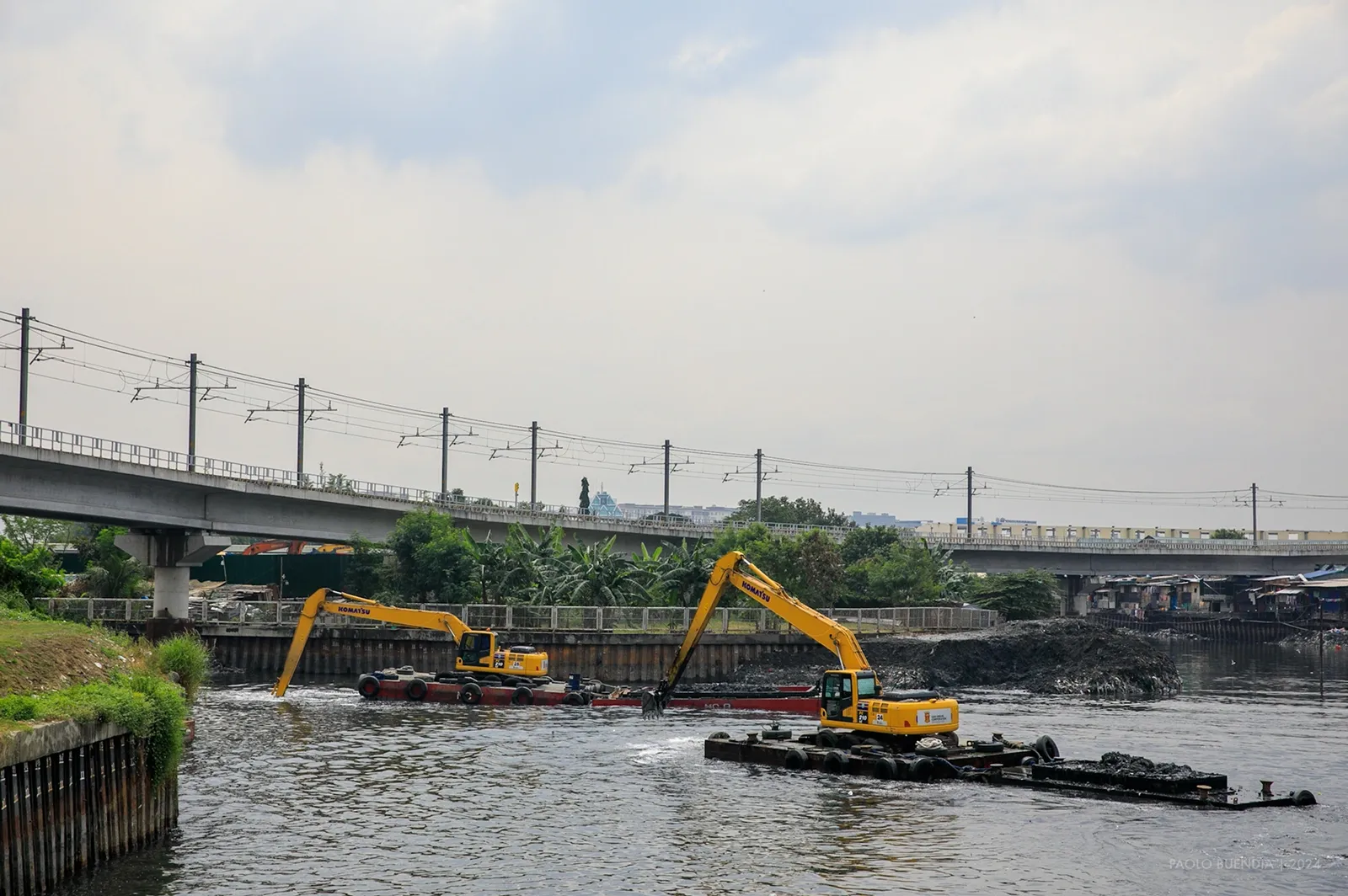 SMC, NNIC joint river cleanups help ease flooding at NAIA, nearby areas